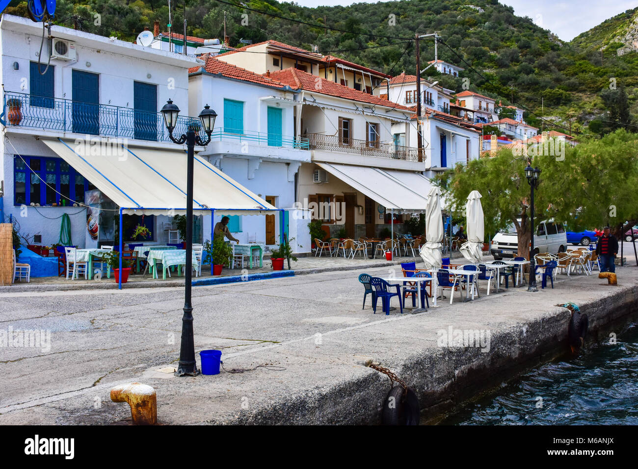 Greek harbour, fishing boats with nets in the traditional fisherman ...