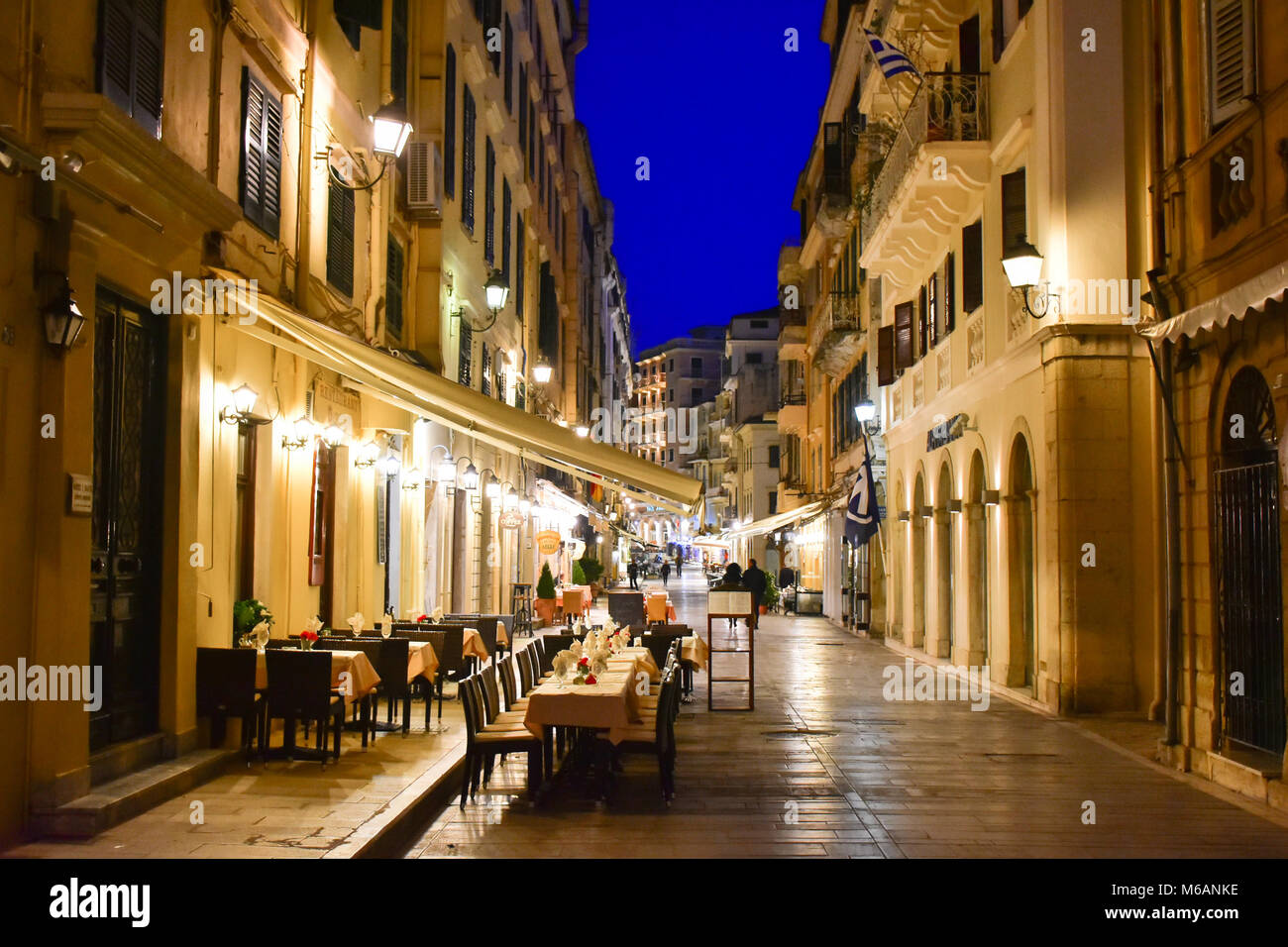 Corfu old town (Kerkyra) city streets at night with restaurants and ...