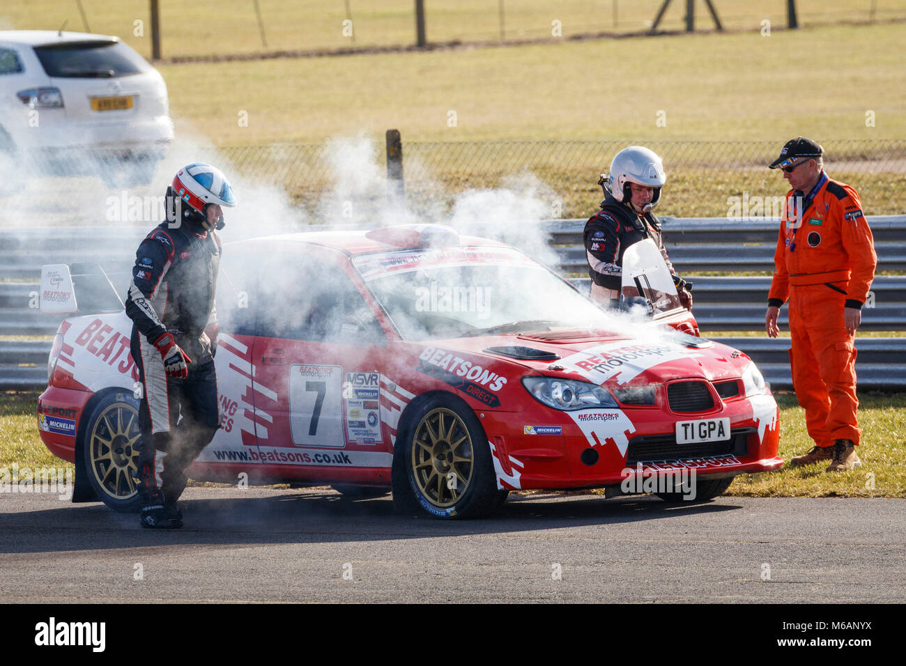 Motorsport fire hi-res stock photography and images - Alamy