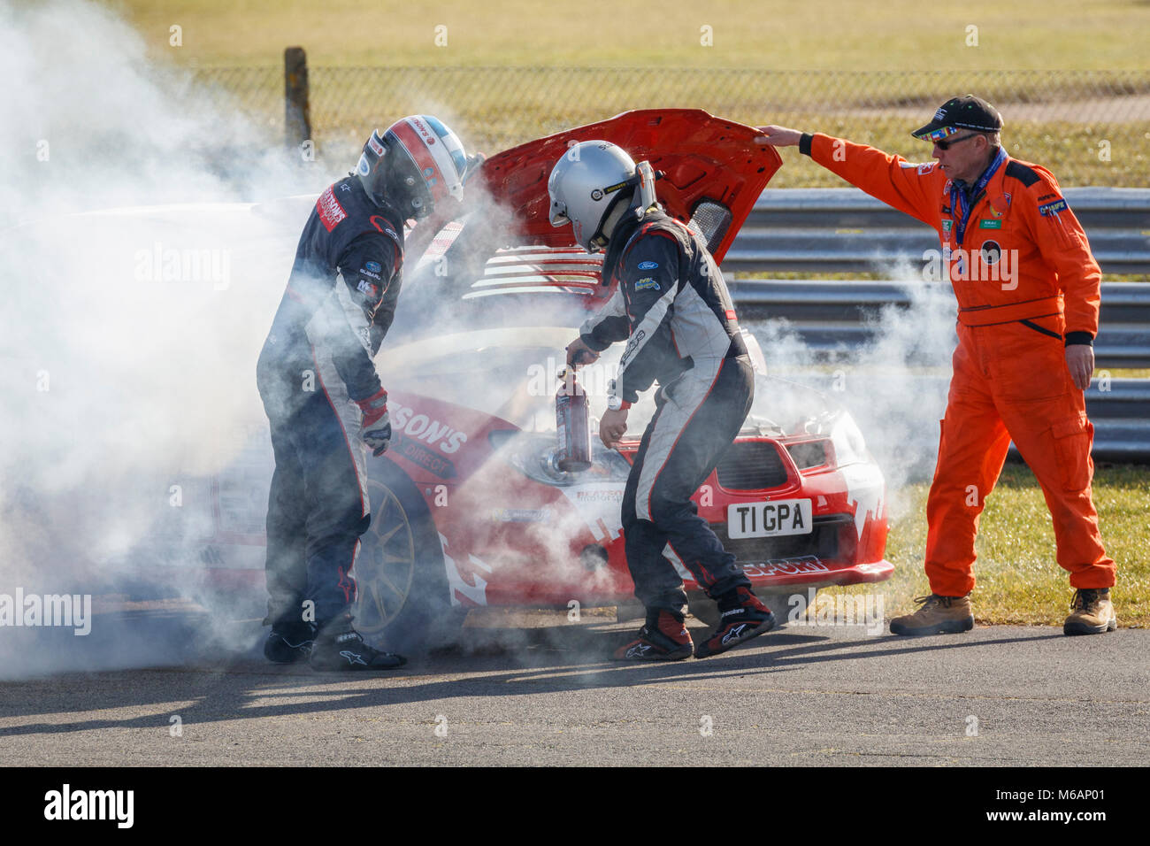 Motorsport fire hi-res stock photography and images - Alamy