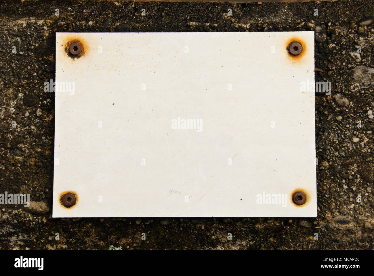Empty board/sign on the wall Stock Photo - Alamy