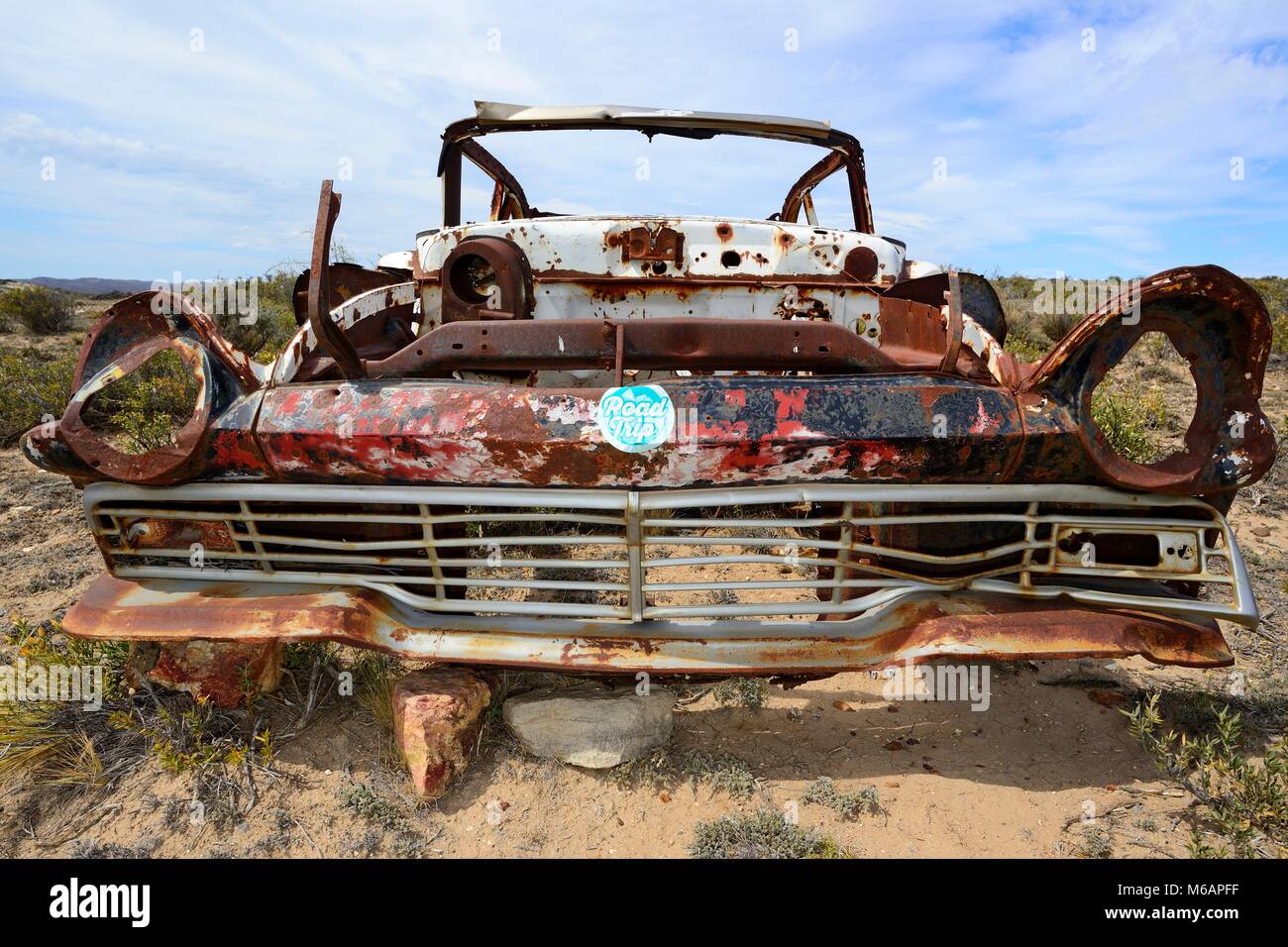 Rusty car wreck at the roadside, Camarones, Chubut, Argentina Stock ...