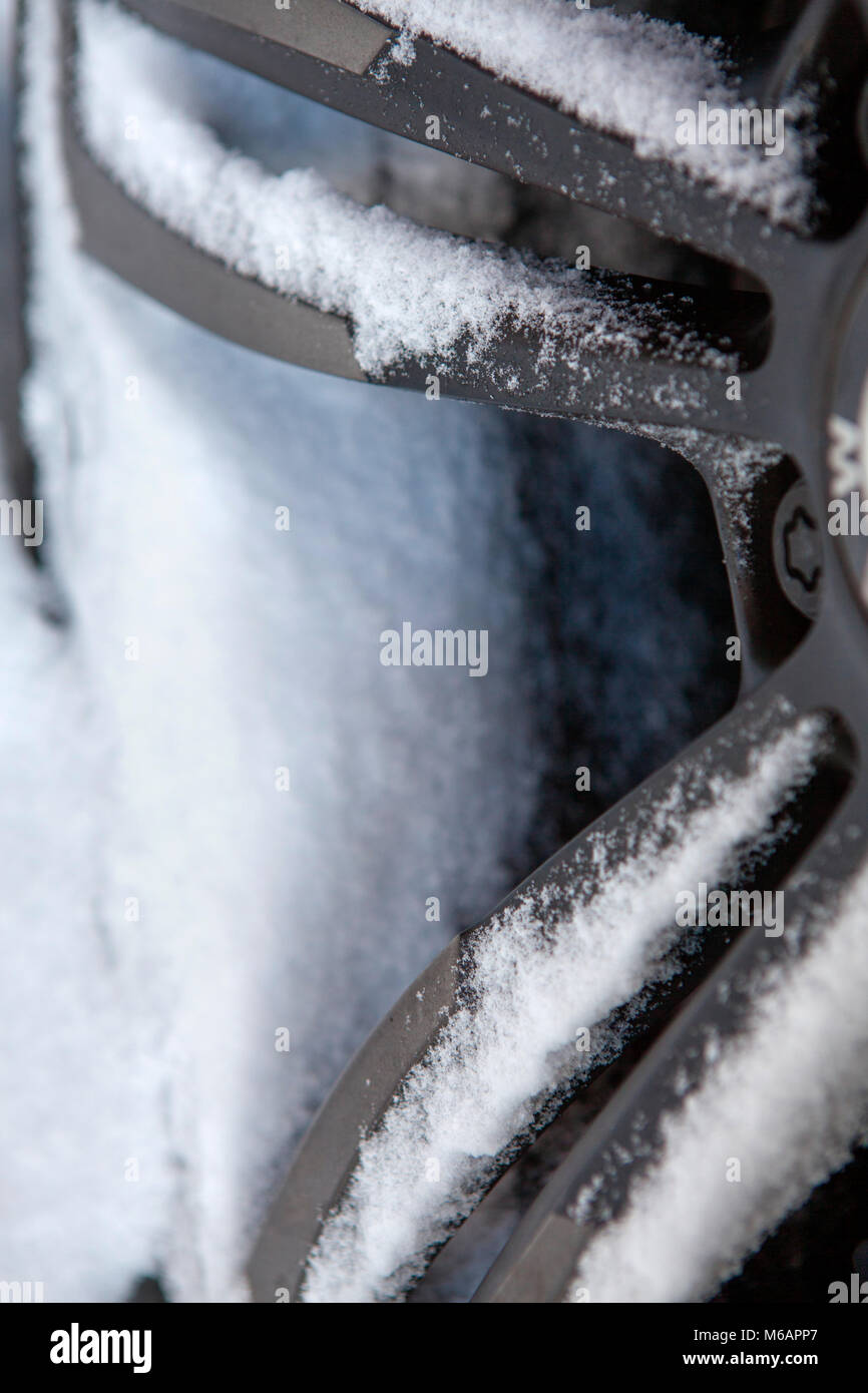 Snow and Ice close up detail of a Black F83 BMW M4 Convertible badge ...