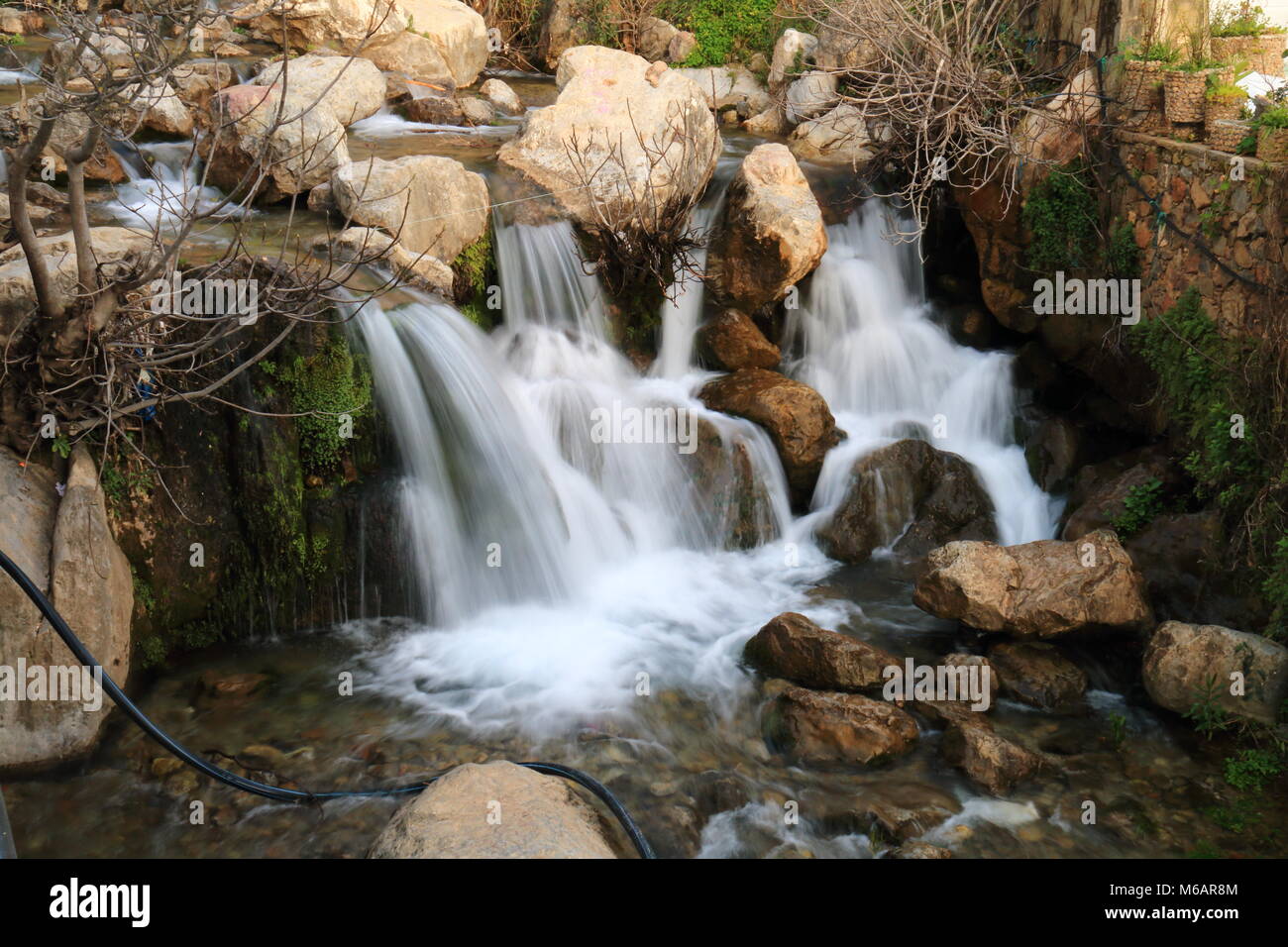 Waterfall at the Ras Elma spring in the town of Chefchaouen in northern ...