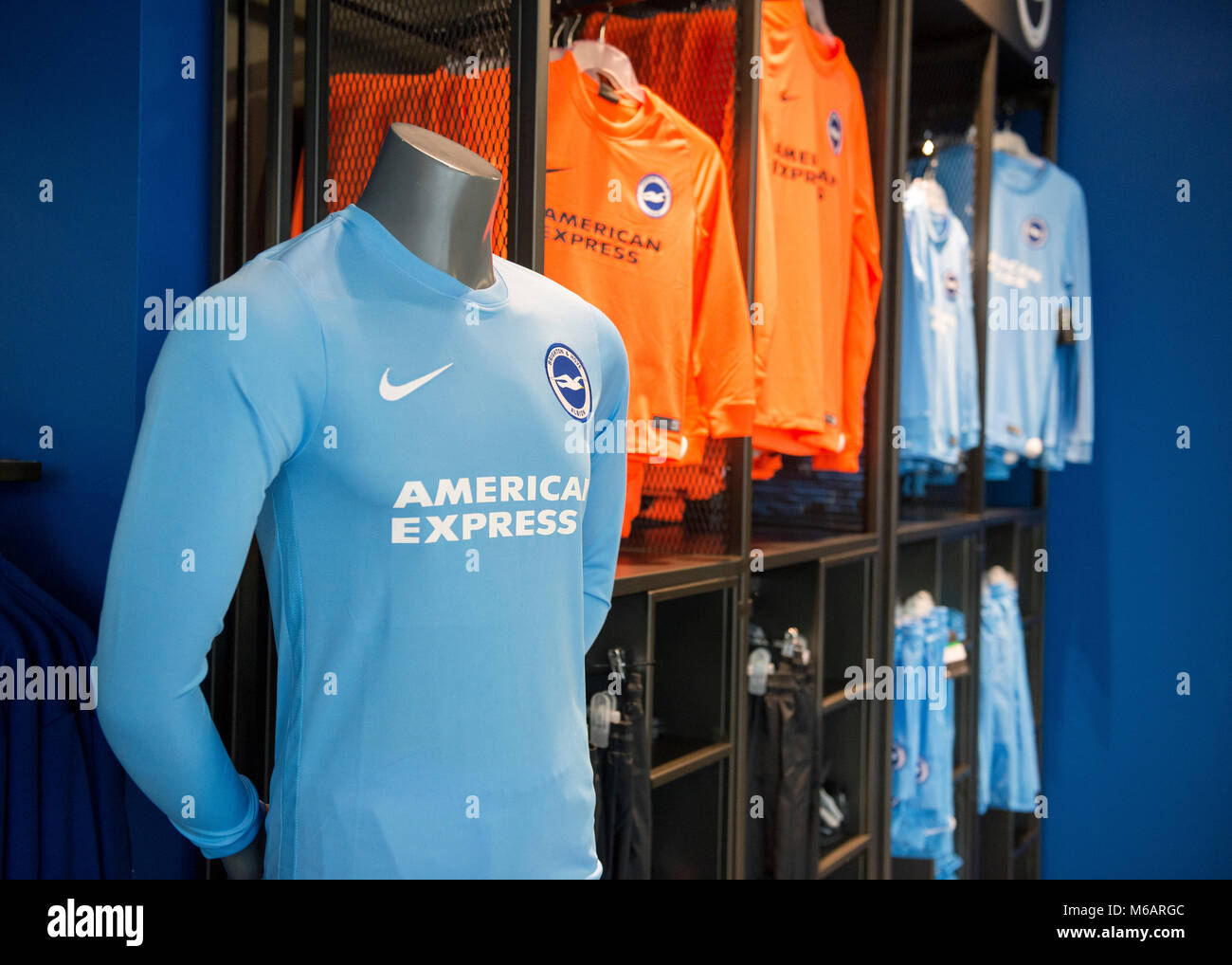 photos of the display of football kit and merchandise in the club shop ...