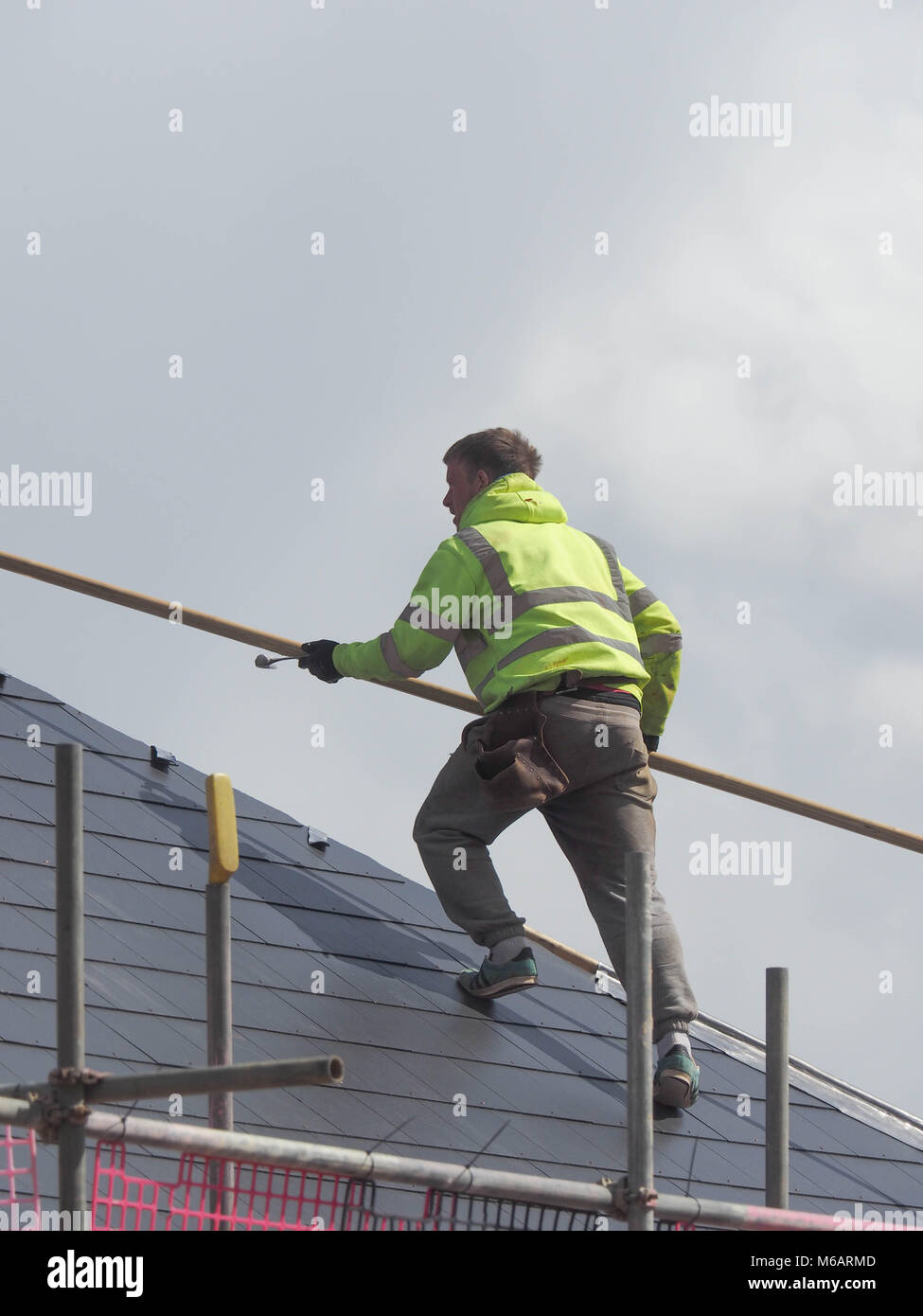 ROOFING CONTRACTORS WORKING ON ROOF OF NEW BUILD HOPKINS HOMES ...
