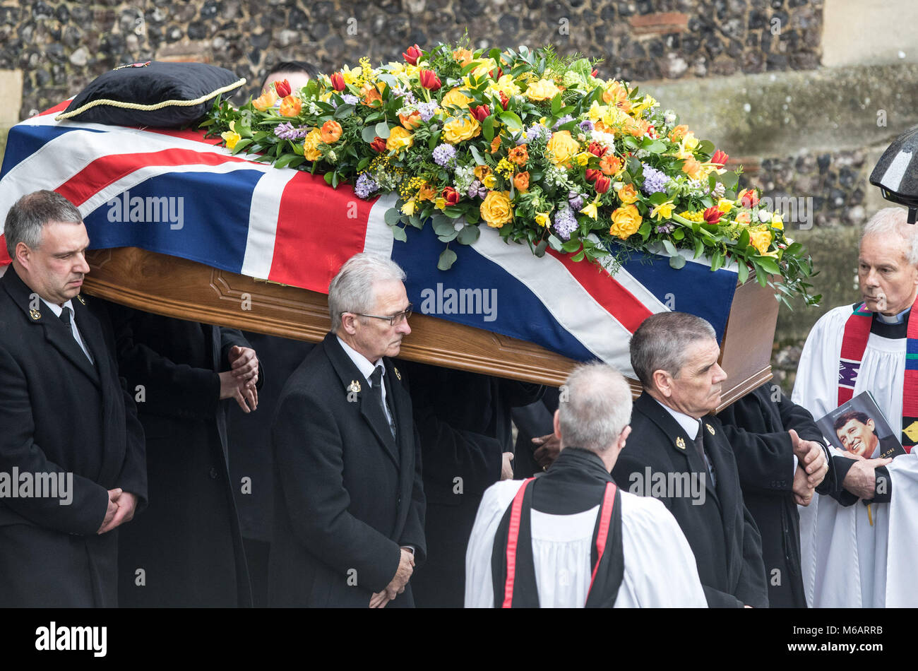 Graham Taylor's coffin is carried out to the hearse following the ...