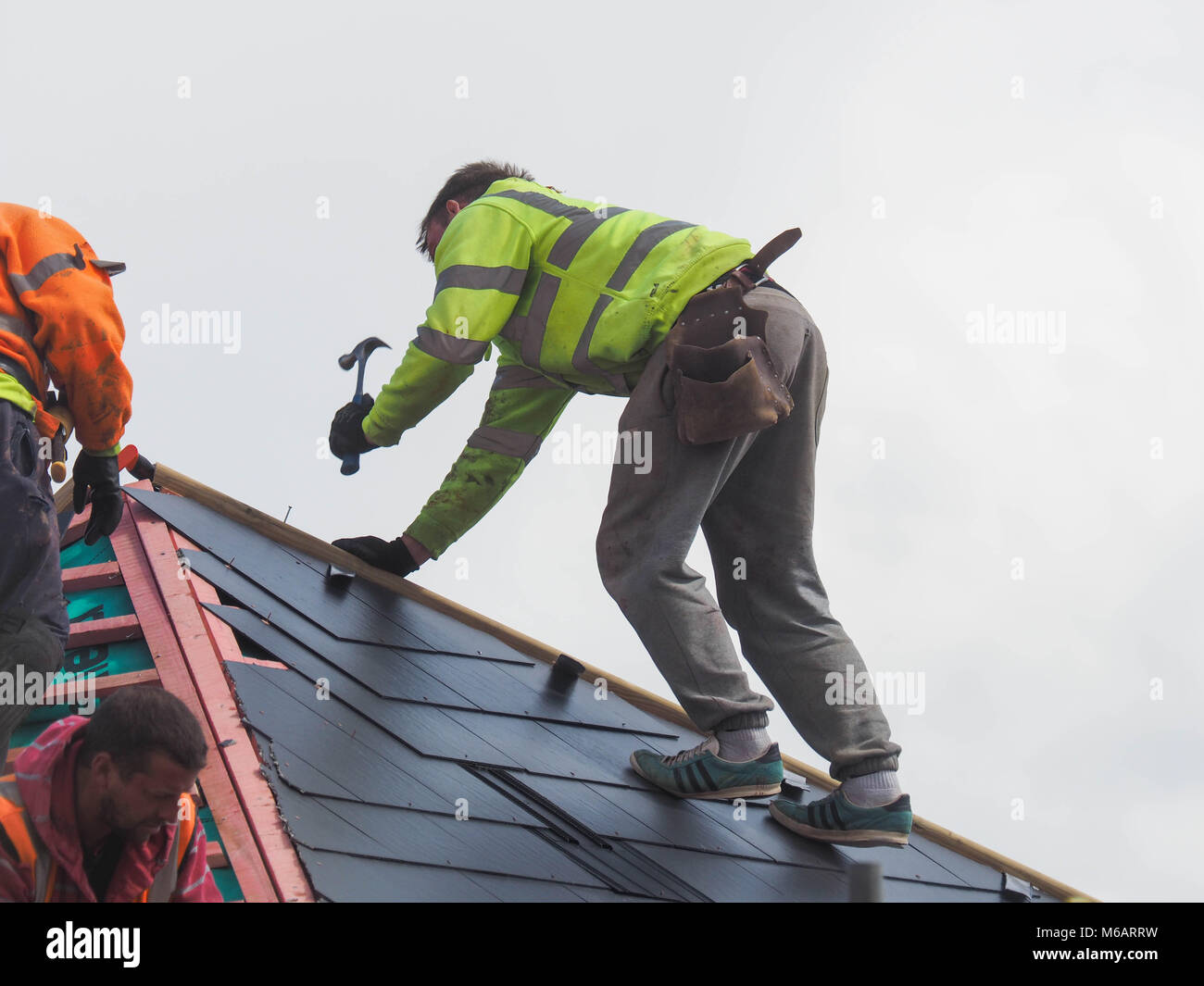 ROOFING CONTRACTORS WORKING ON ROOF OF NEW BUILD HOPKINS HOMES ...
