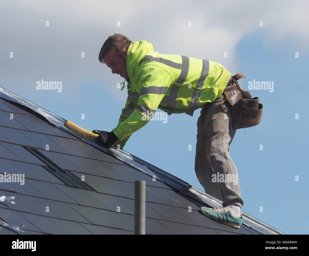 ROOFING CONTRACTORS WORKING ON ROOF OF NEW BUILD HOPKINS HOMES ...