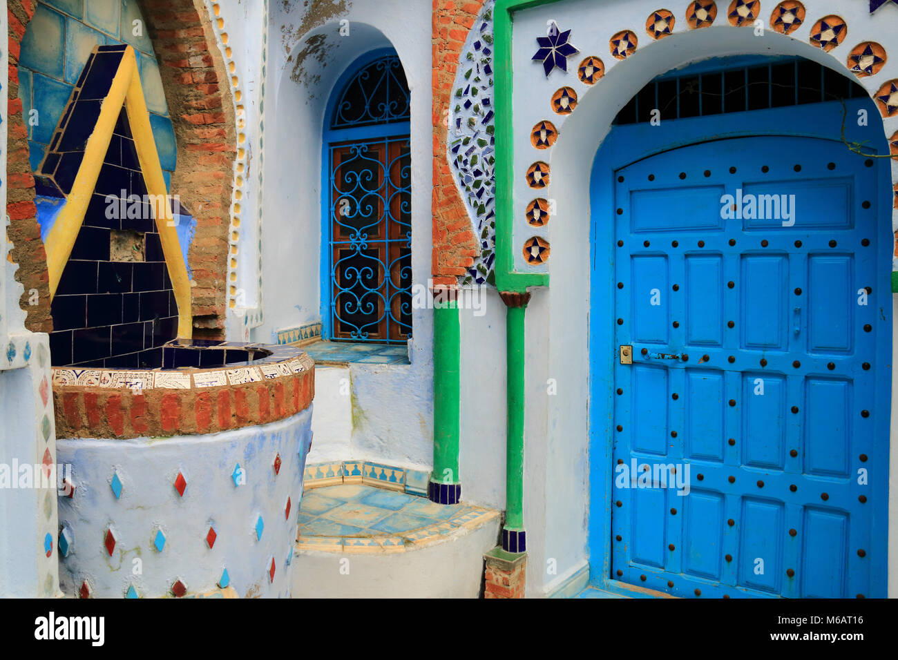 Traditional wooden door of house in the village of Chefchaouen Stock ...