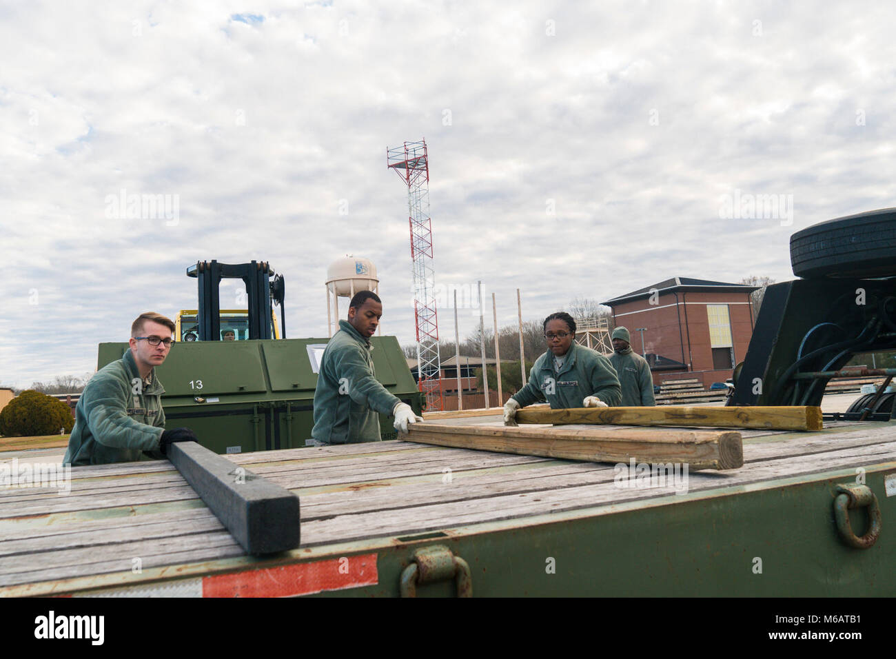 U.S. Air Force Airman 1st Class Alexander Pease-Ingersoll, left, 461st ...