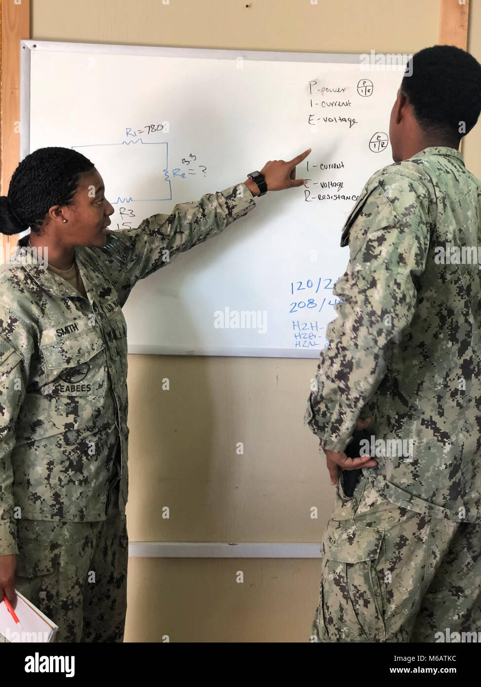 Construction Electrician 2nd Class Charlette Smith, a Seabee assigned ...