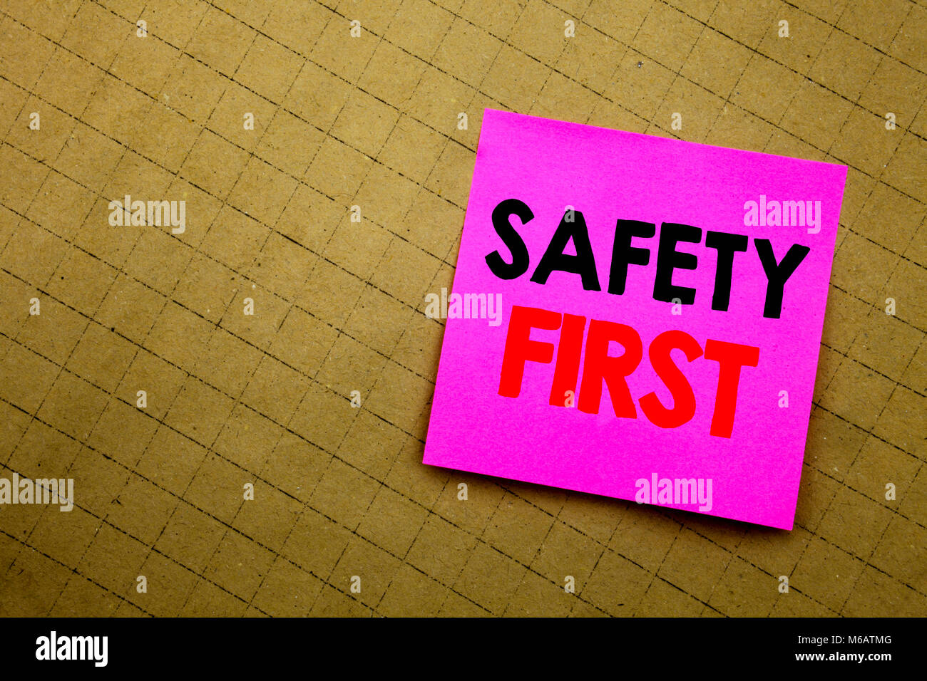 Handwritten text caption showing Safety First. Business concept writing ...