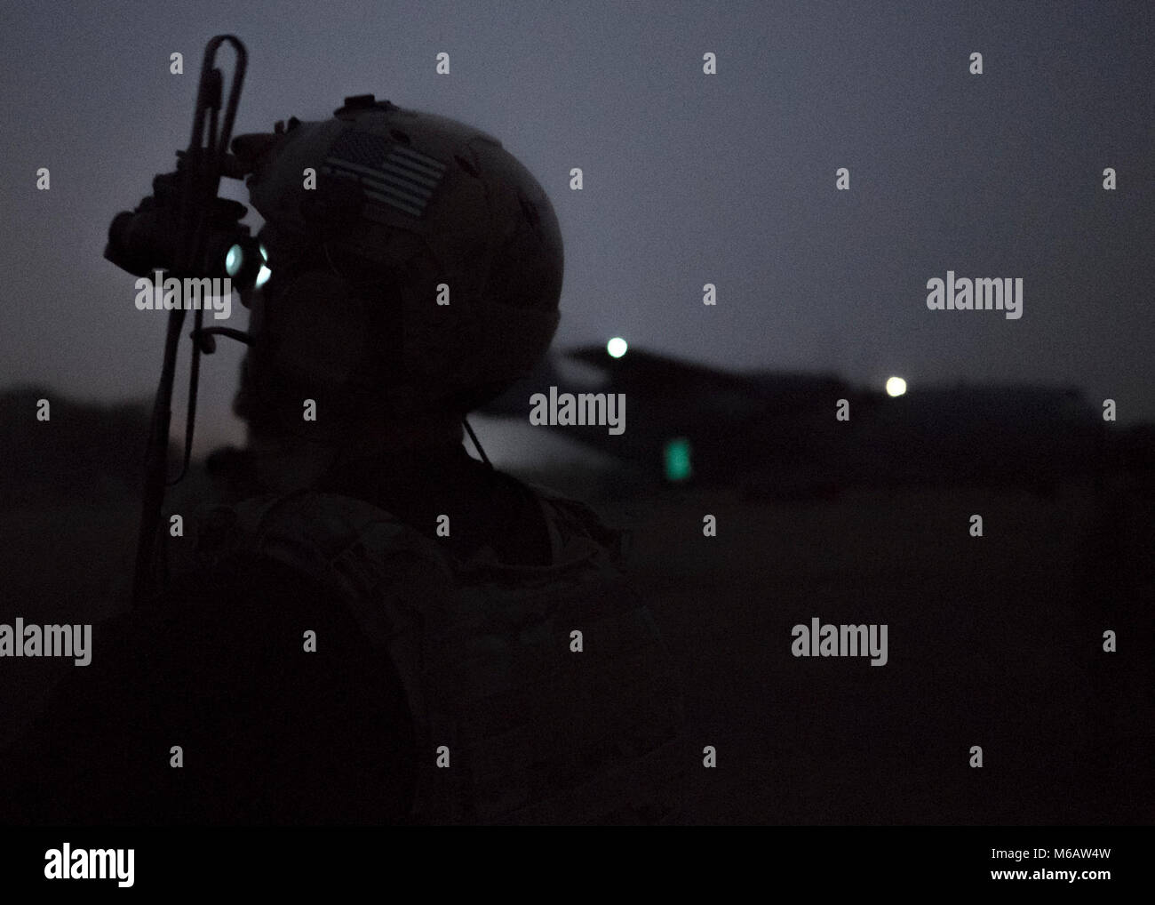 A 320th Special Tactics Squadron operator maintains security while a U ...