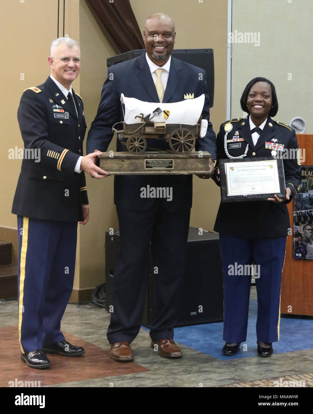 From left: Col. Steven Carozza, commander, 1st Cavalry Division ...