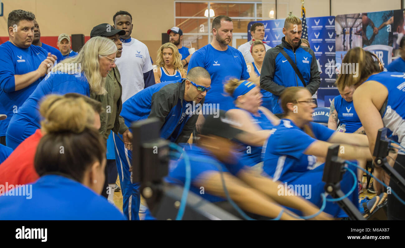 Wounded warrior athletes compete in a four minute race during the ...