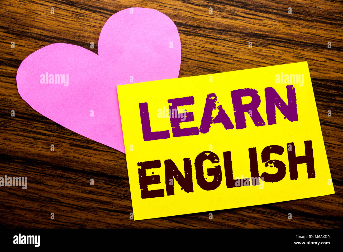 Hand writing text caption inspiration showing Learn English. Business ...