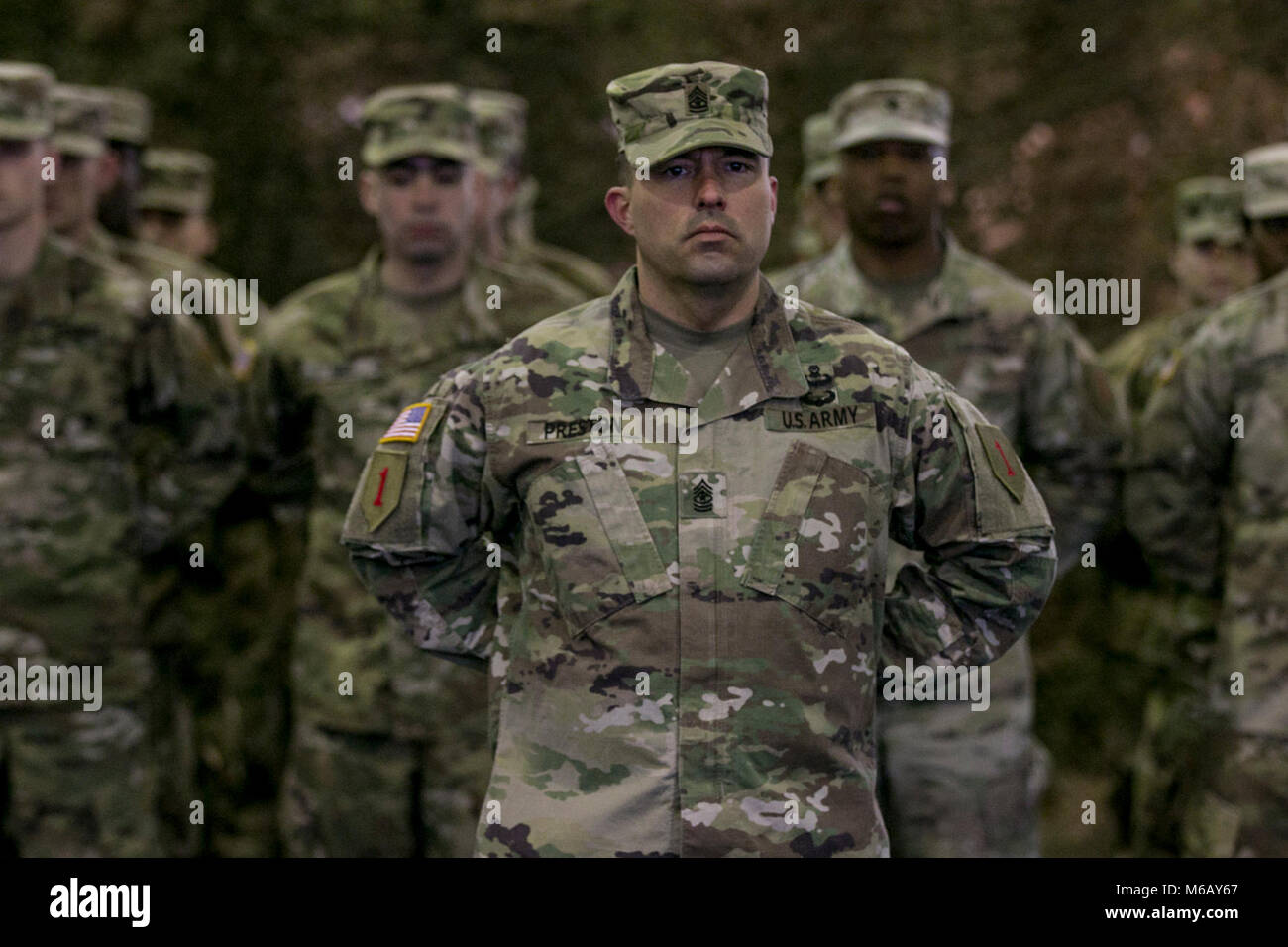 Sgt. Maj. Terry Preston, stands in front of a formation of 1st Infantry ...