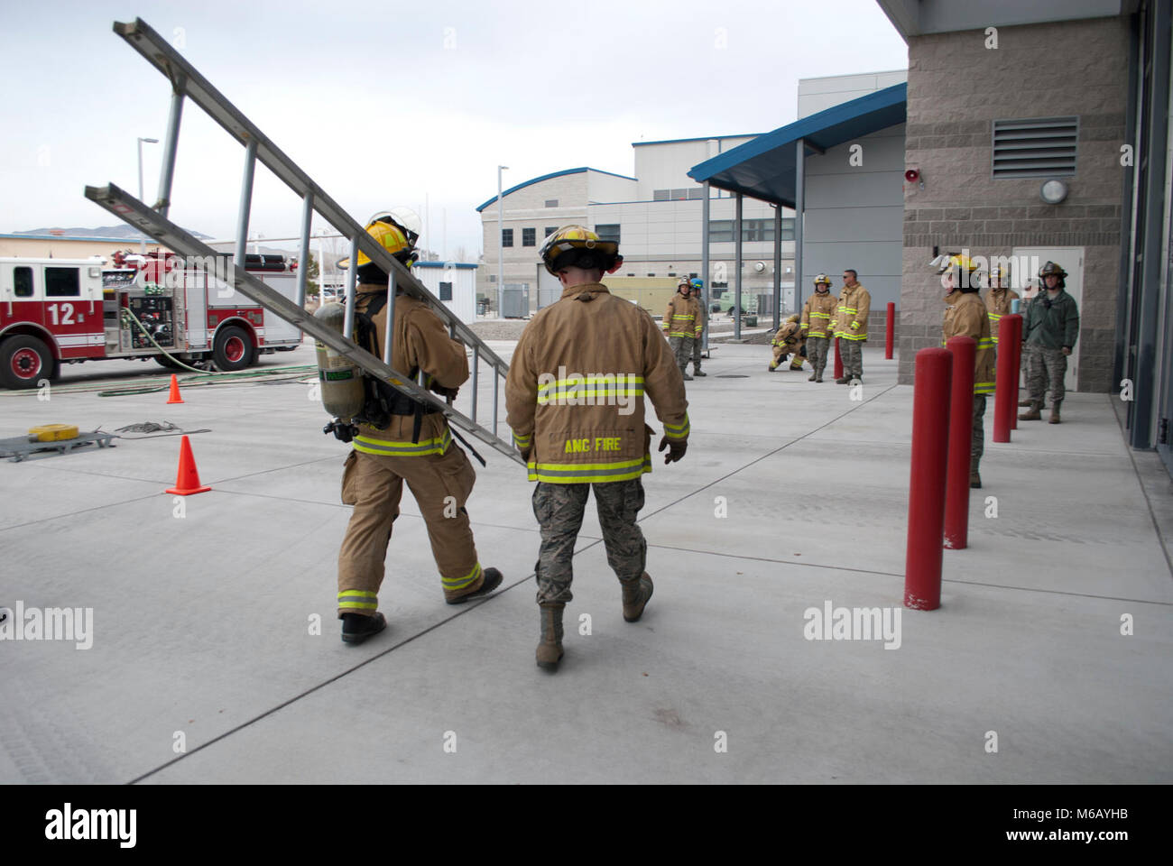 Firefighters assigned to the 152nd Civil Engineer Squadron with the ...