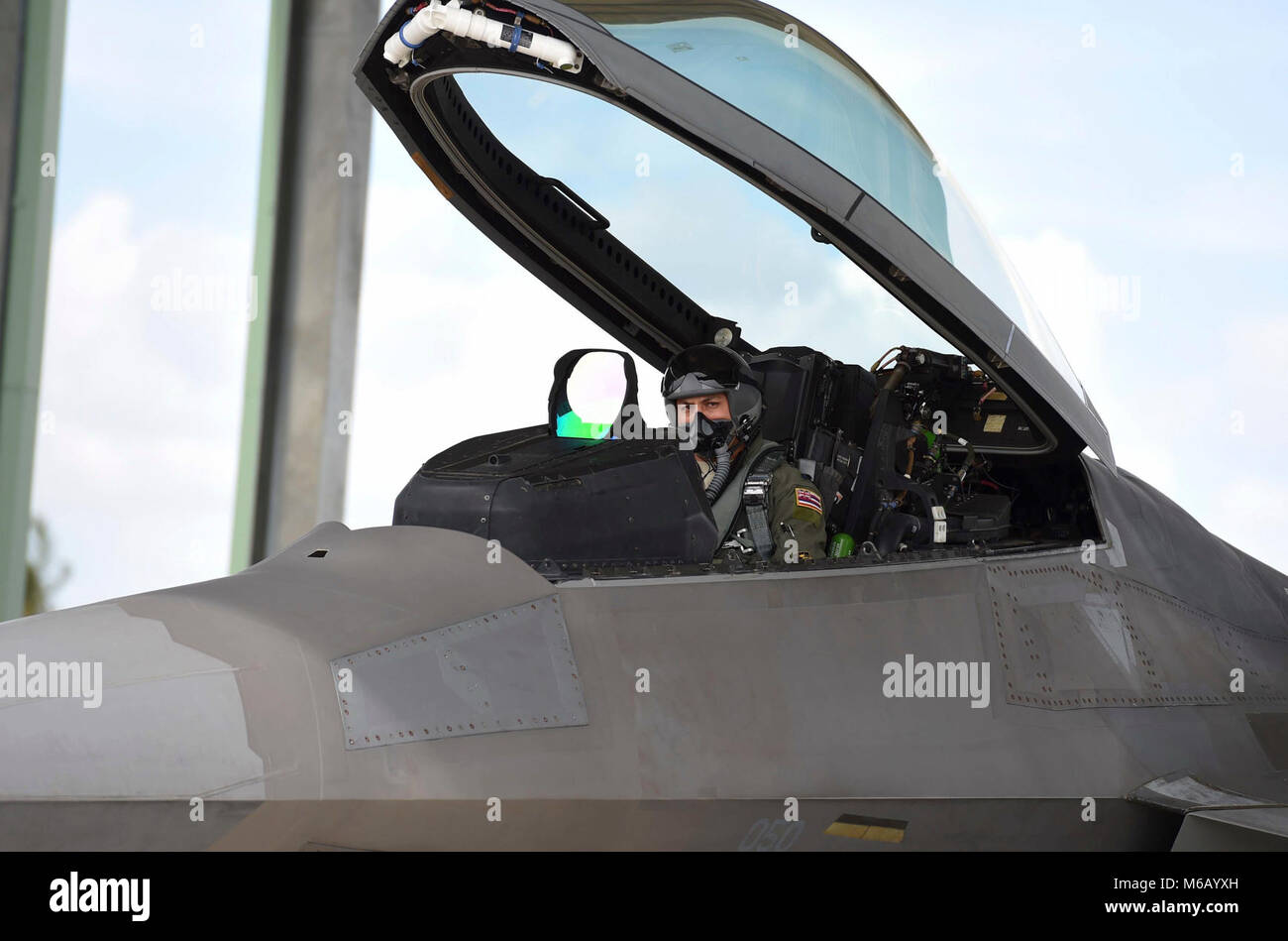 A pilot in 199th Fighter Squadron prepares his F-22 Rapter for takeoff ...