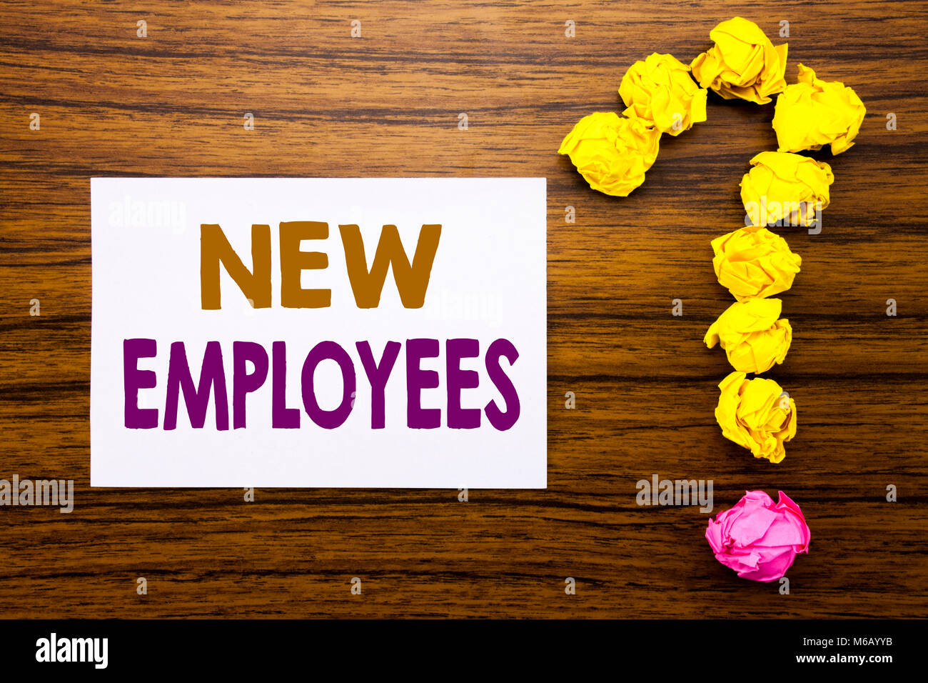 Handwritten text showing New Employees. Business concept for Welcome ...