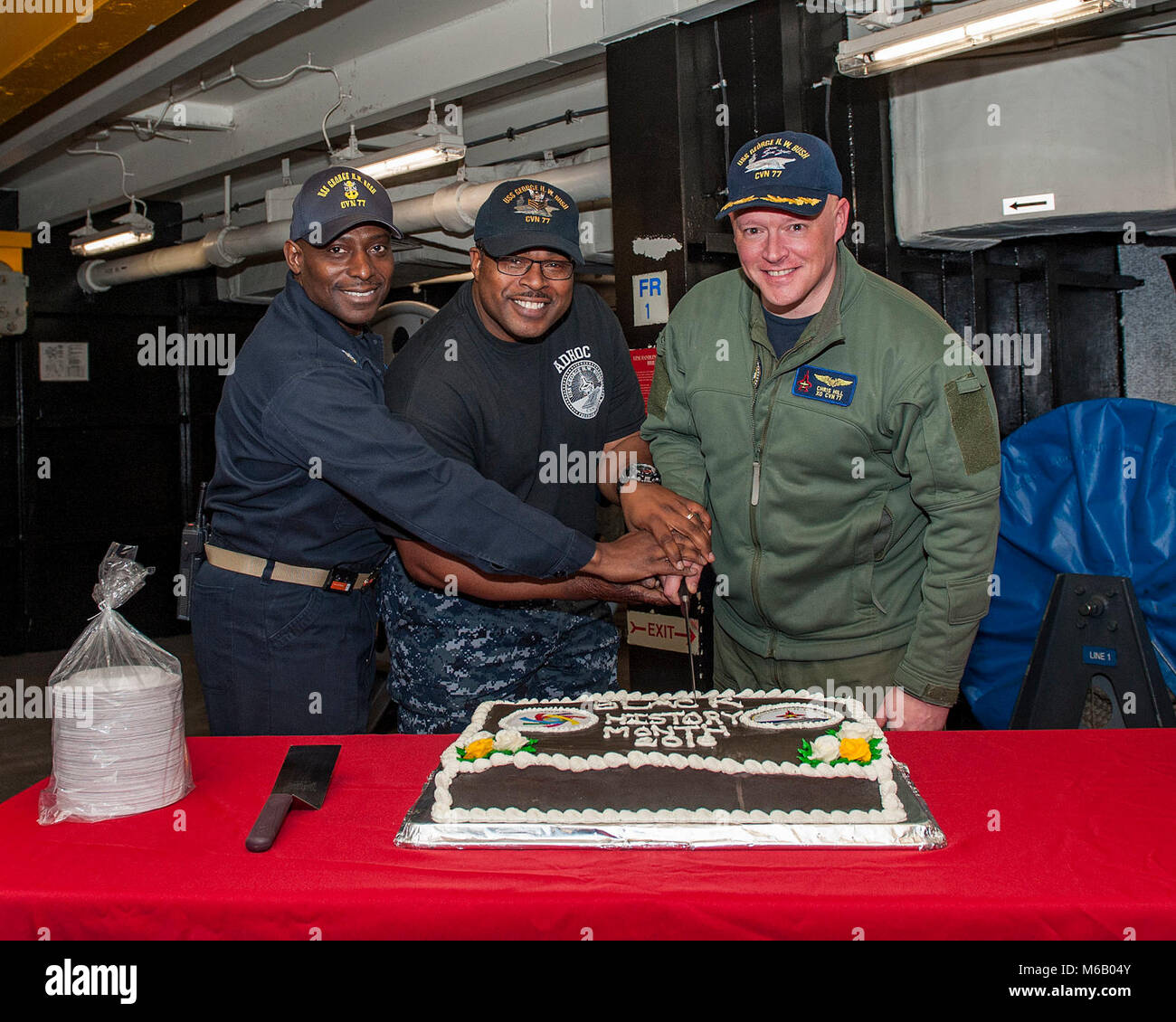 NORFOLK, Va (Feb. 23, 2018) Left to right, Command Master Chief Huben ...