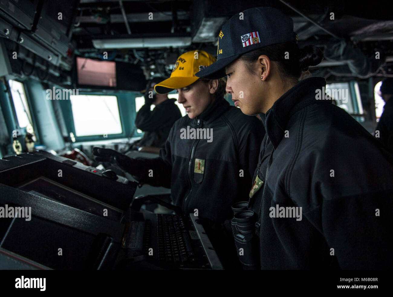 SEA (Feb. 24, 2018) Ensigns Karyn Lee, left, and Michelle Nelson look ...