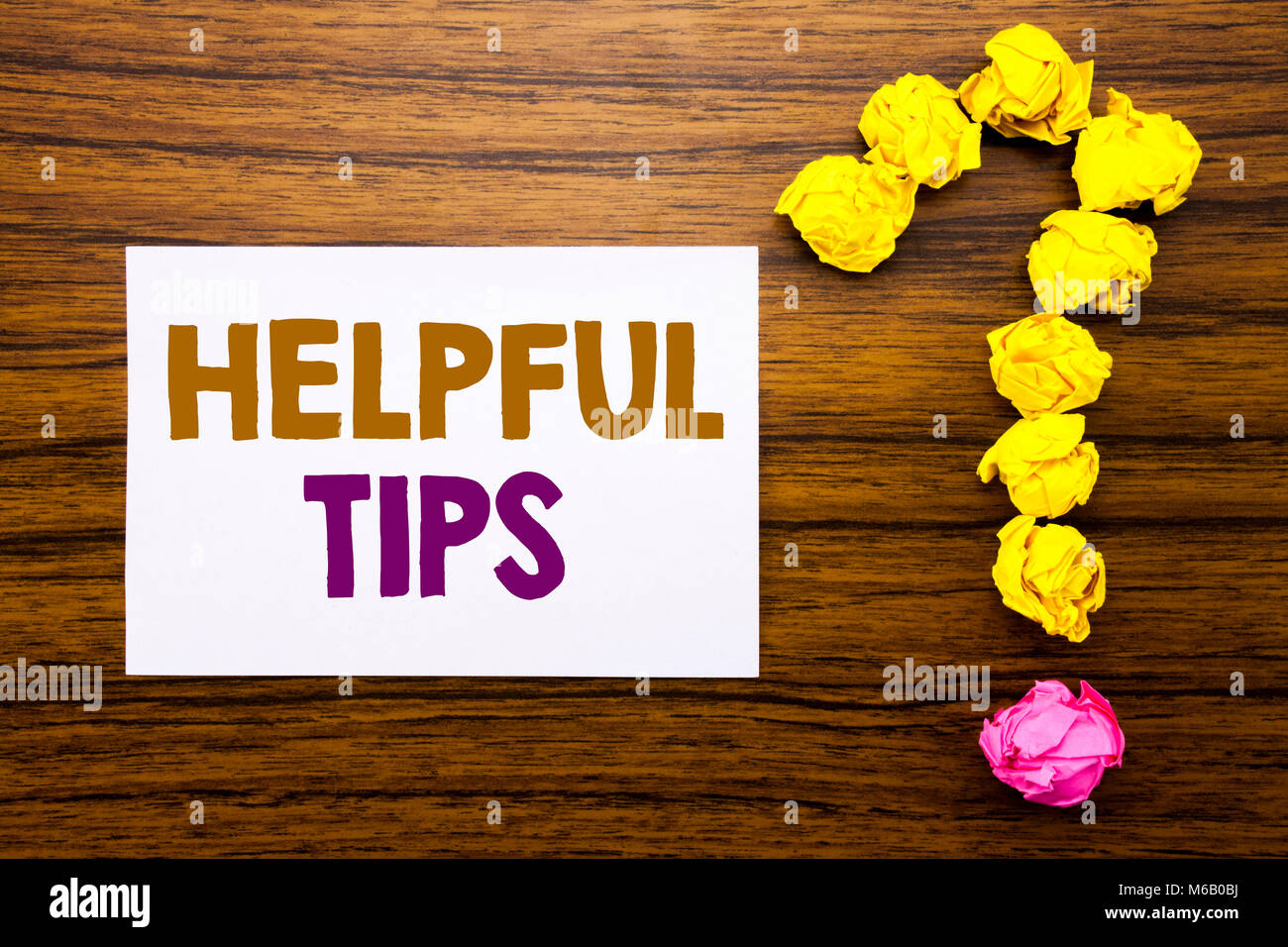 Handwritten text showing Helpful Tips. Business concept for Help in FAQ ...