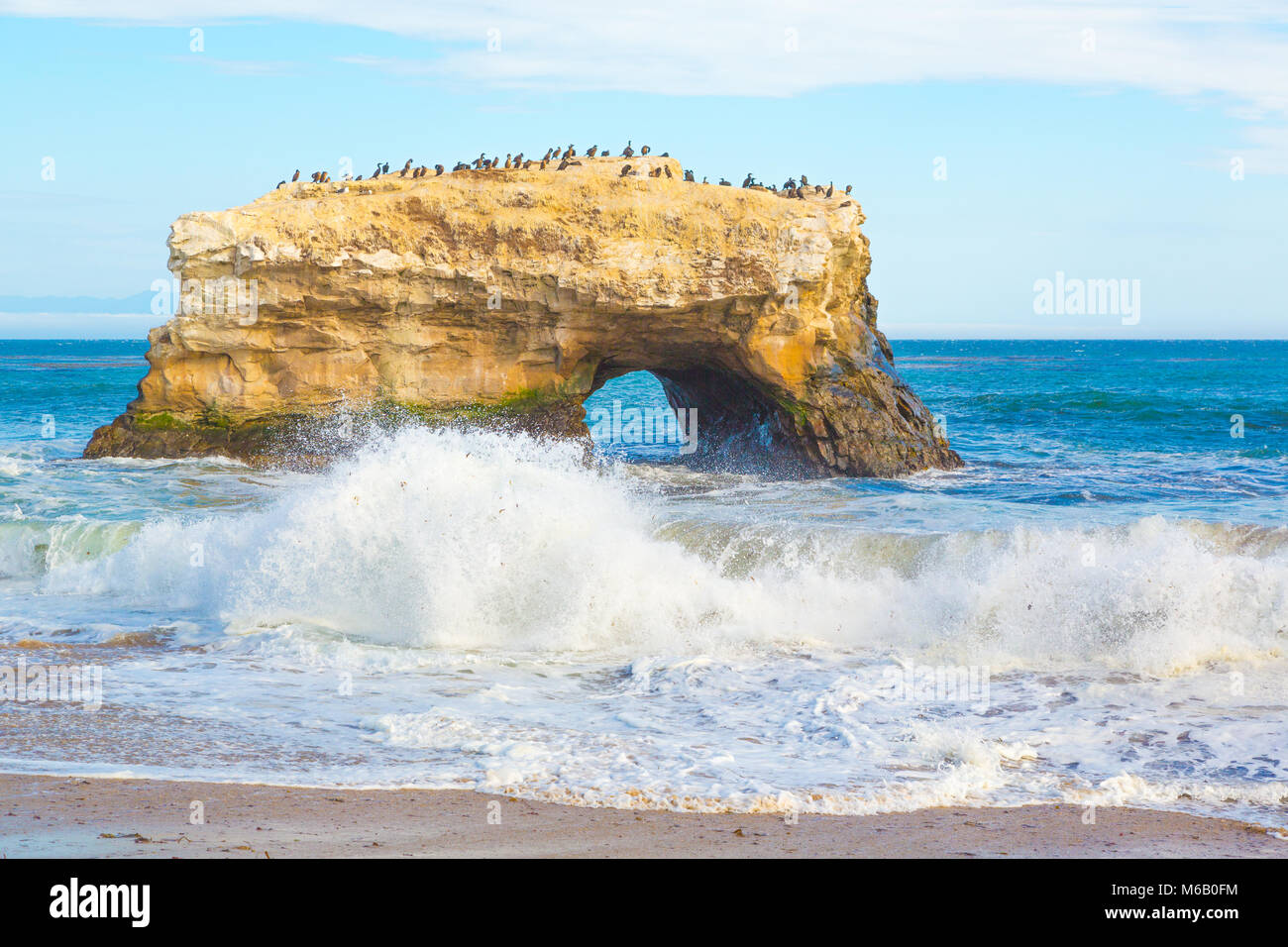 Natural arch rock by the beach in Santa Cruz, California Stock Photo ...