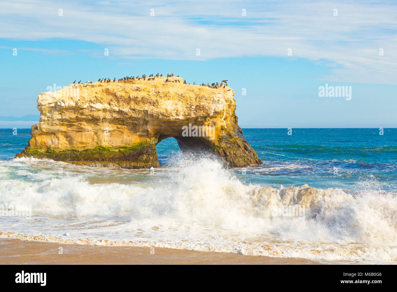 Natural arch rock by the beach in Santa Cruz, California Stock Photo ...