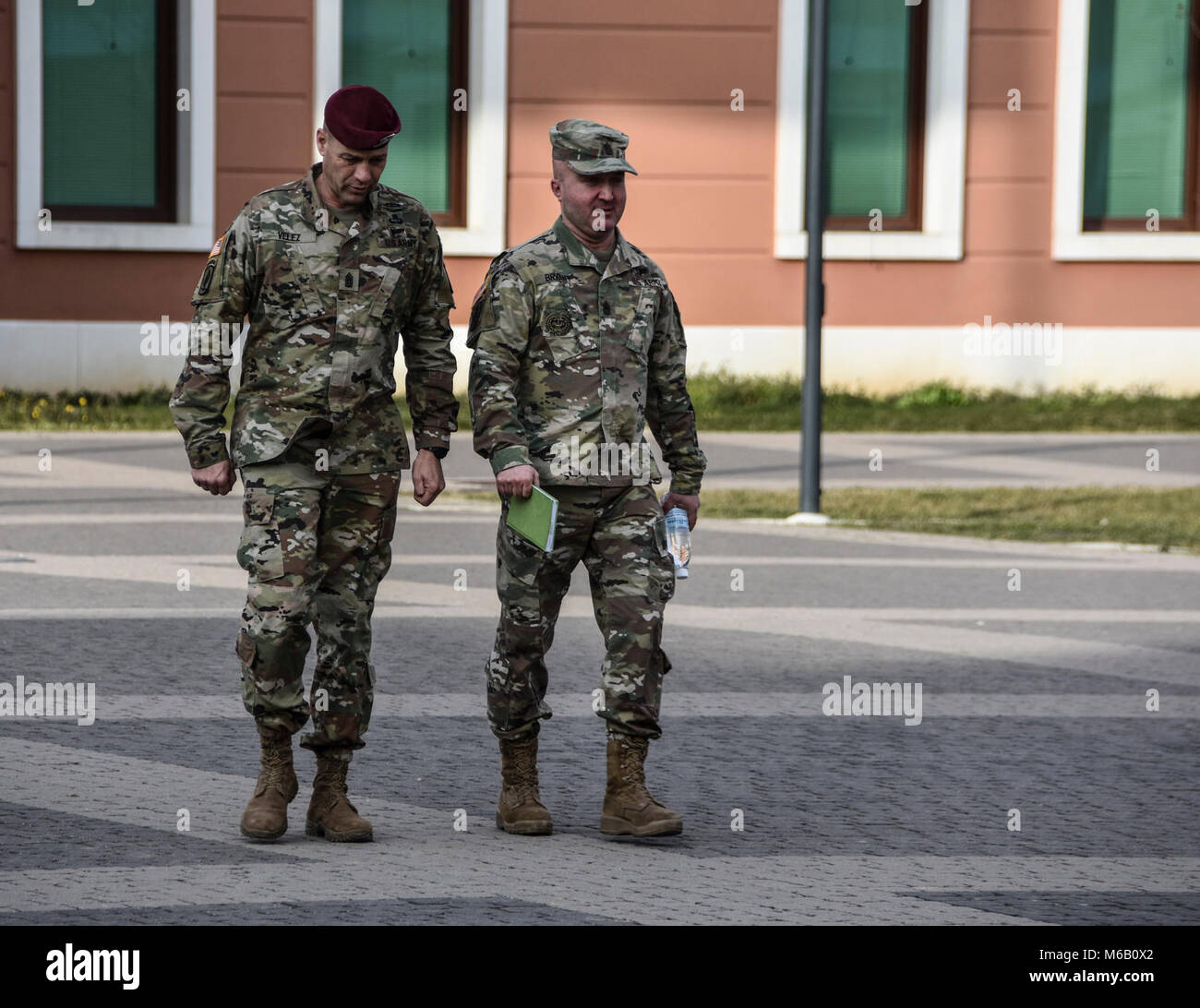 Command Sergeant Majors discuss standards while walking across Caserma ...