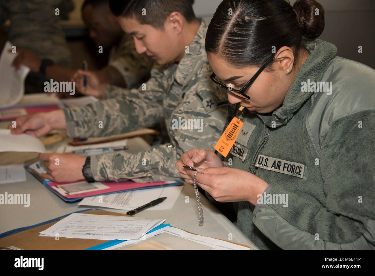 Airman assigned to the 621st Contingency Response Wing, proceed through ...