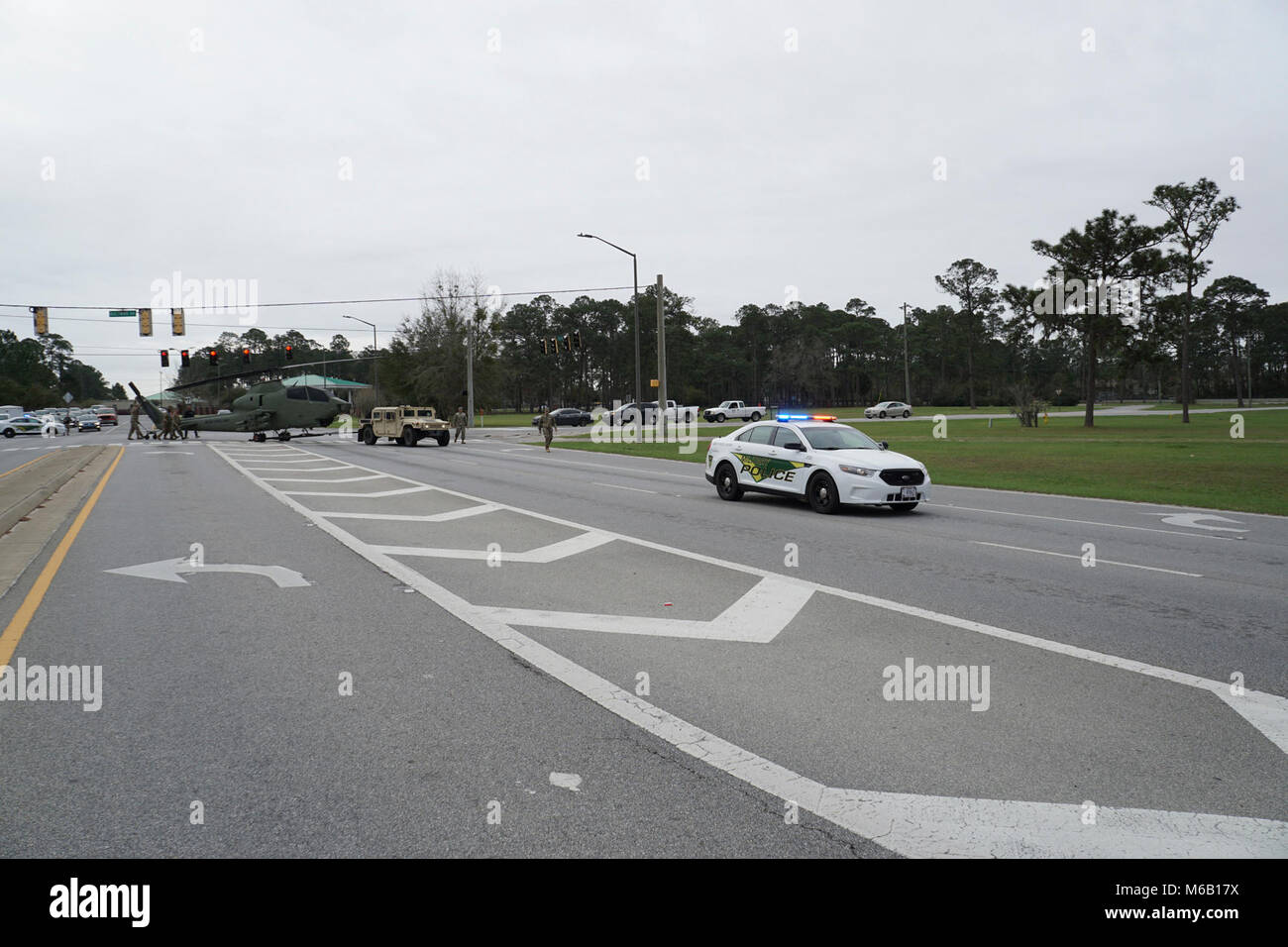 The Fort Stewart main gate static display AH-1 Cobra comes in for one ...