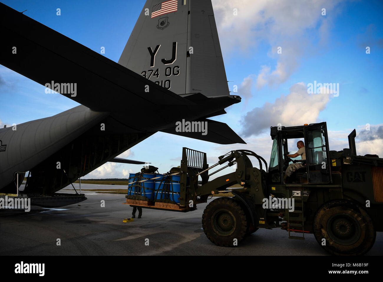 A pallet is loaded onto a U.S. Air Force C-130J Super Hercules for an ...