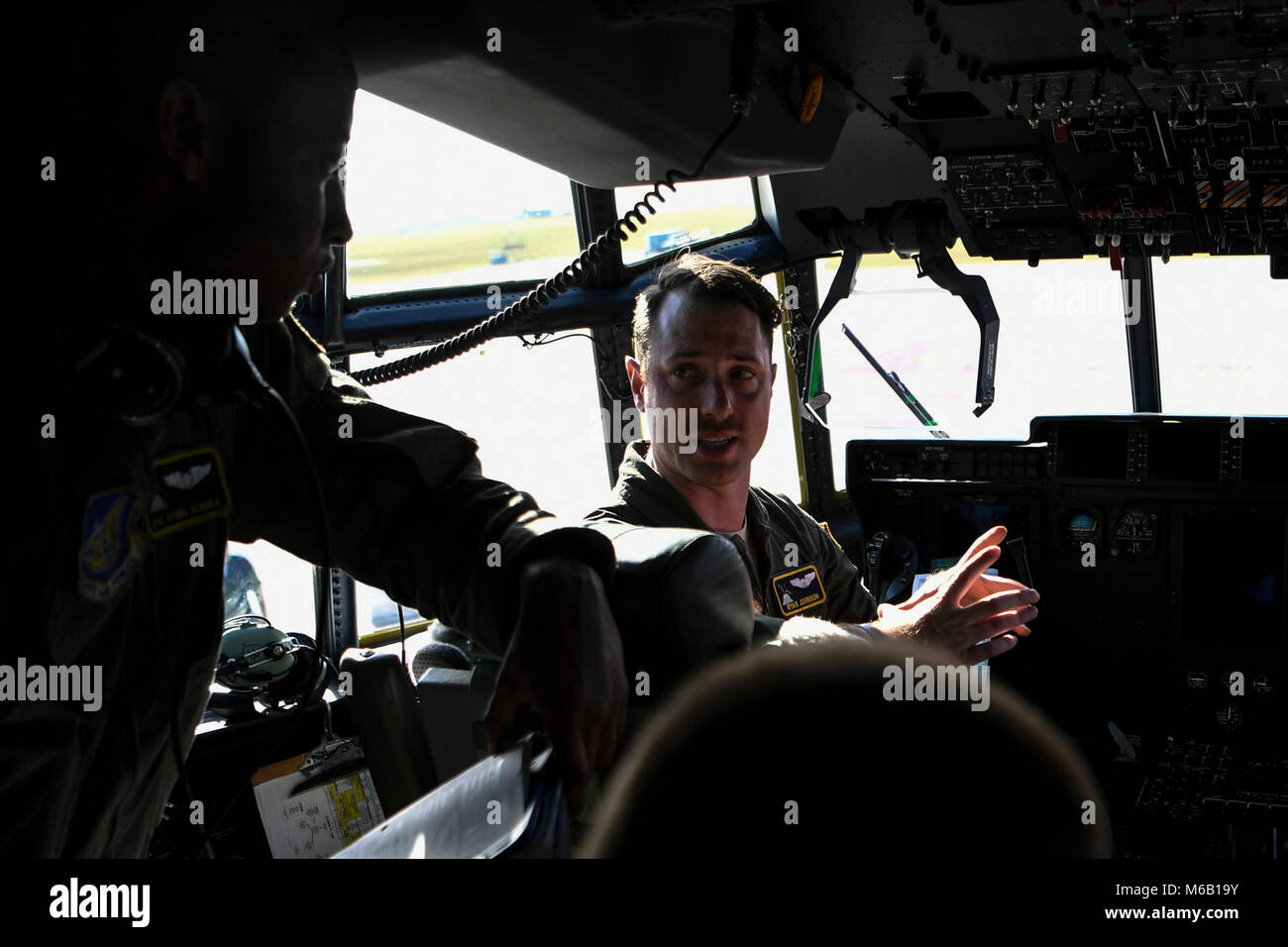 (Right) U.S. Air Force Captain Ryan Johnson, 36th Airlift Squadron ...