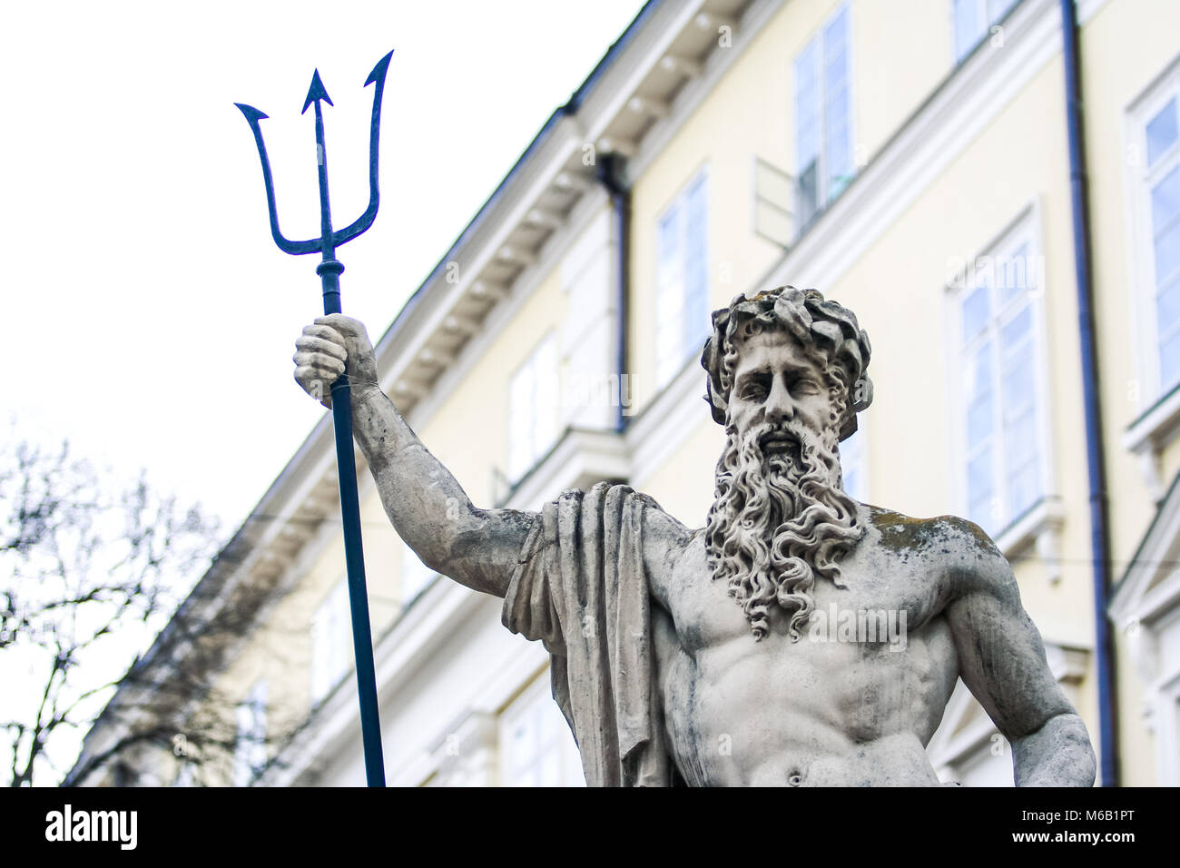 closeup city sculpture of Poseidon with three-pointed trident against ...