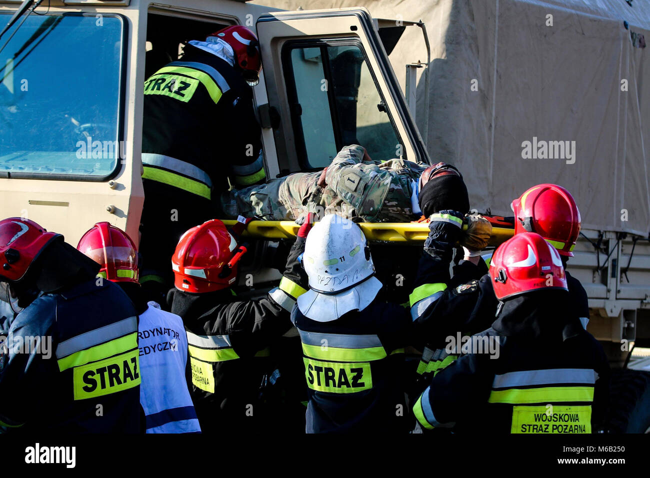 Polish military firefighters with the 5430th Military Fire Brigade, and ...