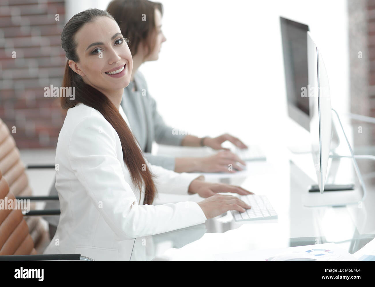 employee of the company working at their workplace Stock Photo - Alamy