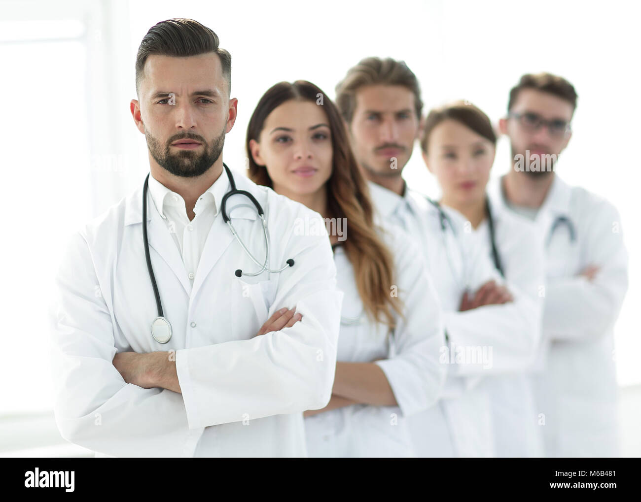 Portrait of medical team standing together Stock Photo - Alamy