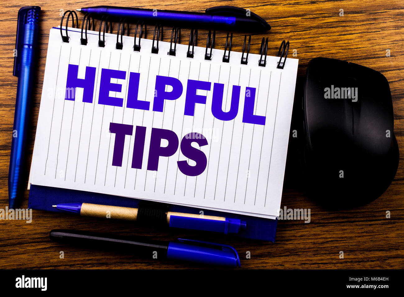 Handwritten text showing Helpful Tips. Business concept for Help in FAQ ...