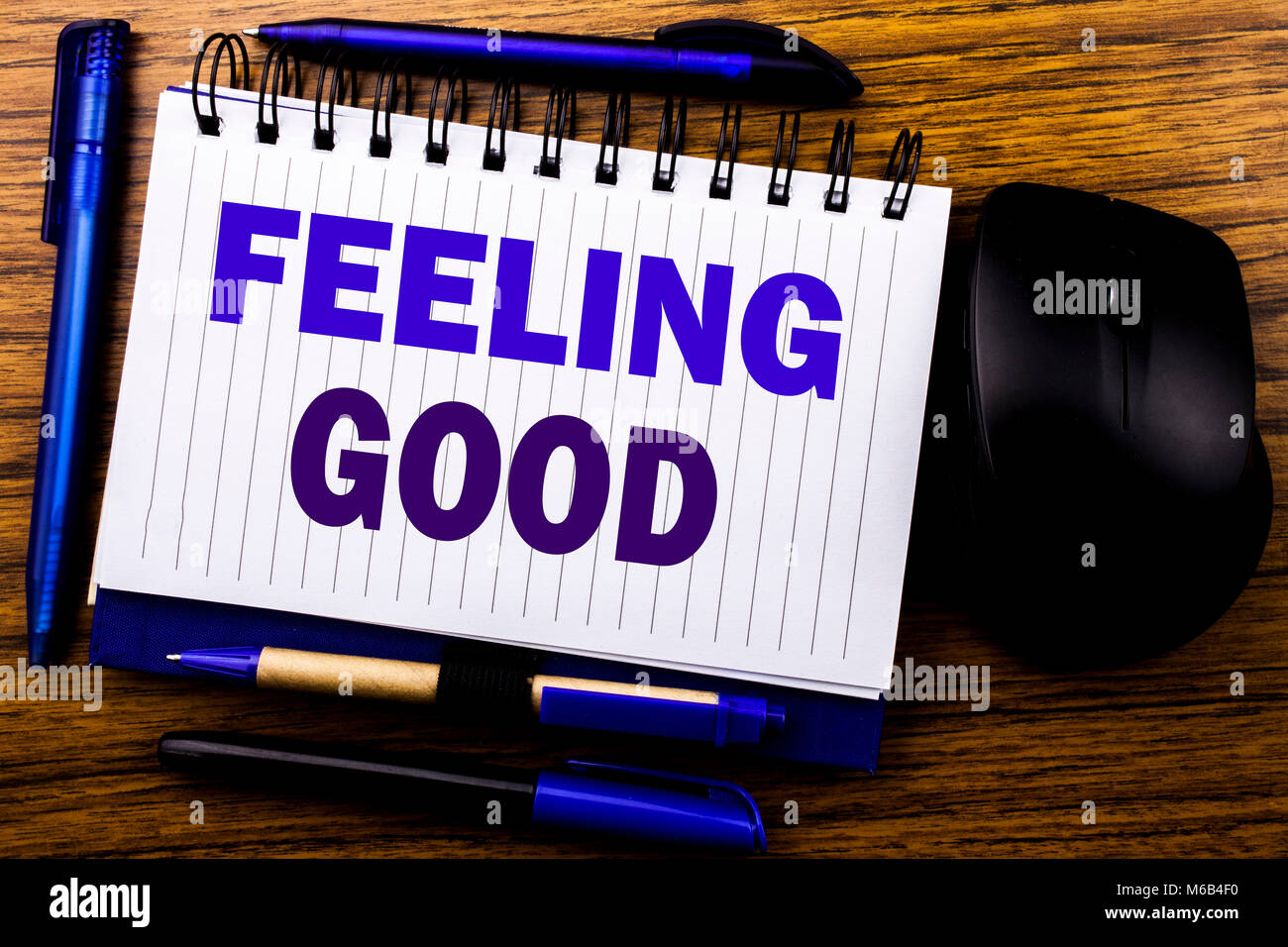 Handwritten text showing Feeling Good. Business concept for Happy ...