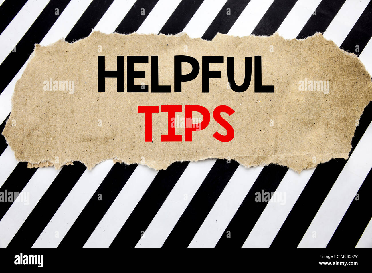Handwritten text showing Helpful Tips. Business concept writing for ...
