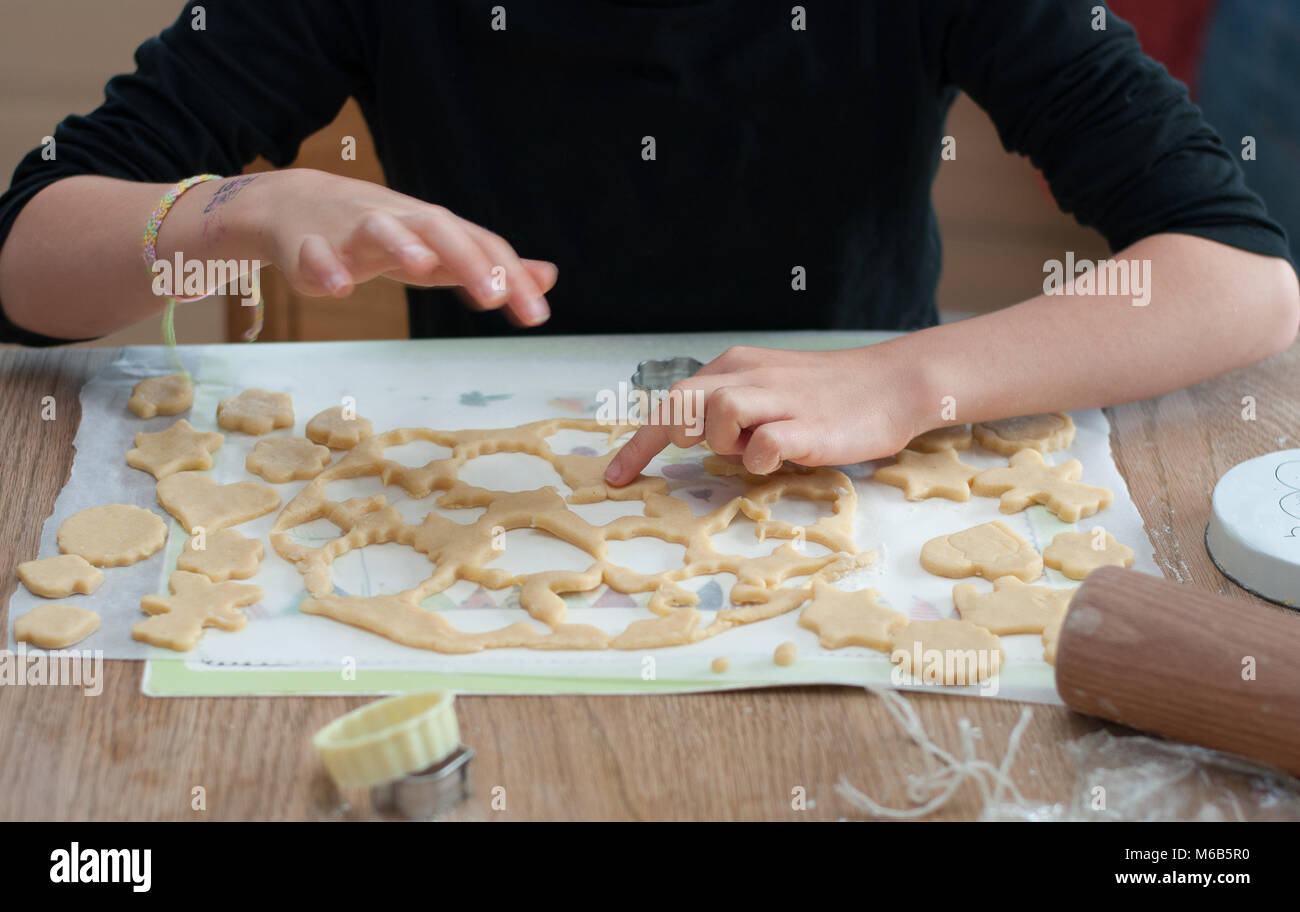 Child cooking cookies in a kitchen Stock Photo - Alamy