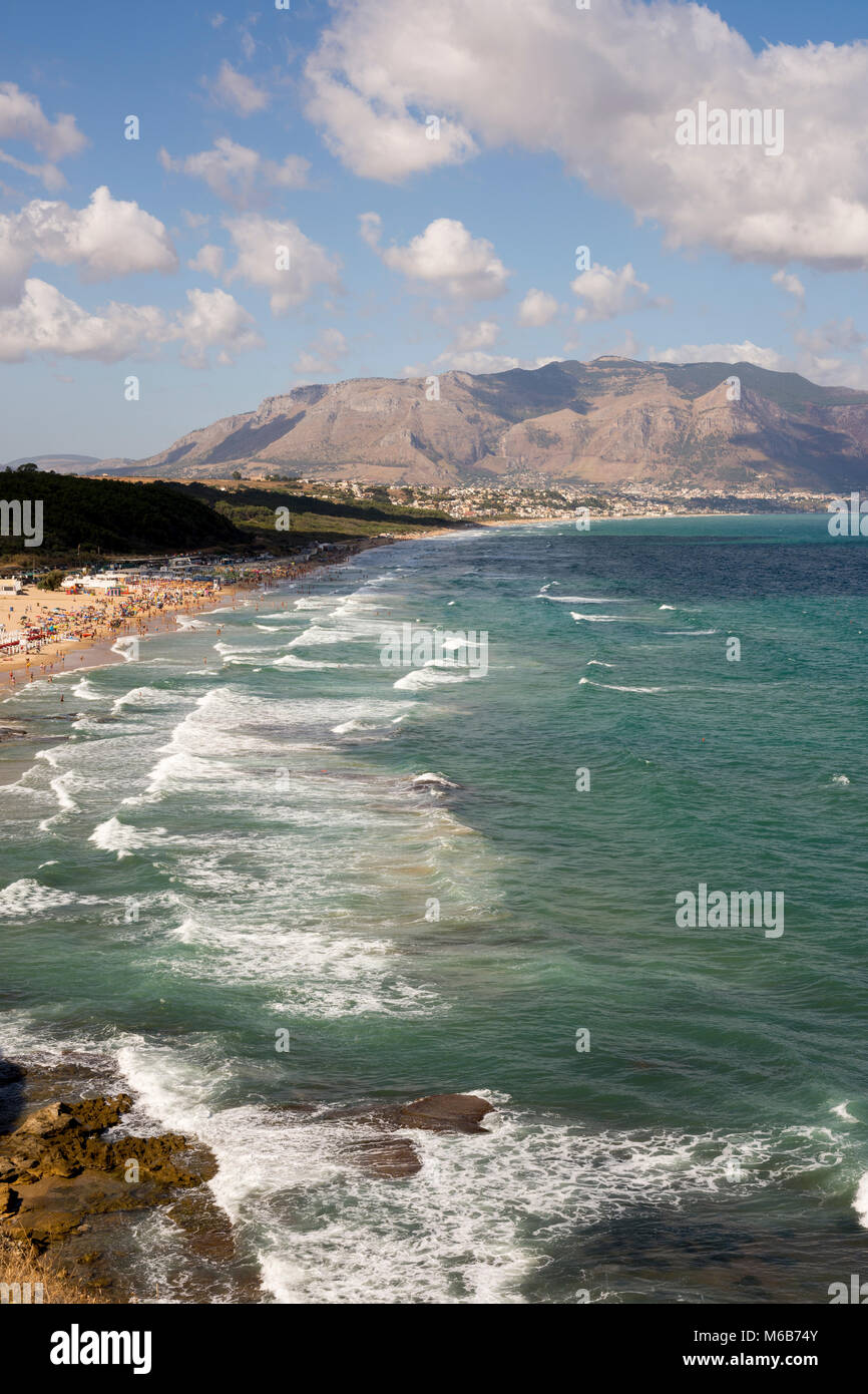 crystal clear sea and frothy waves on the beaches of Palermo in Sicily ...