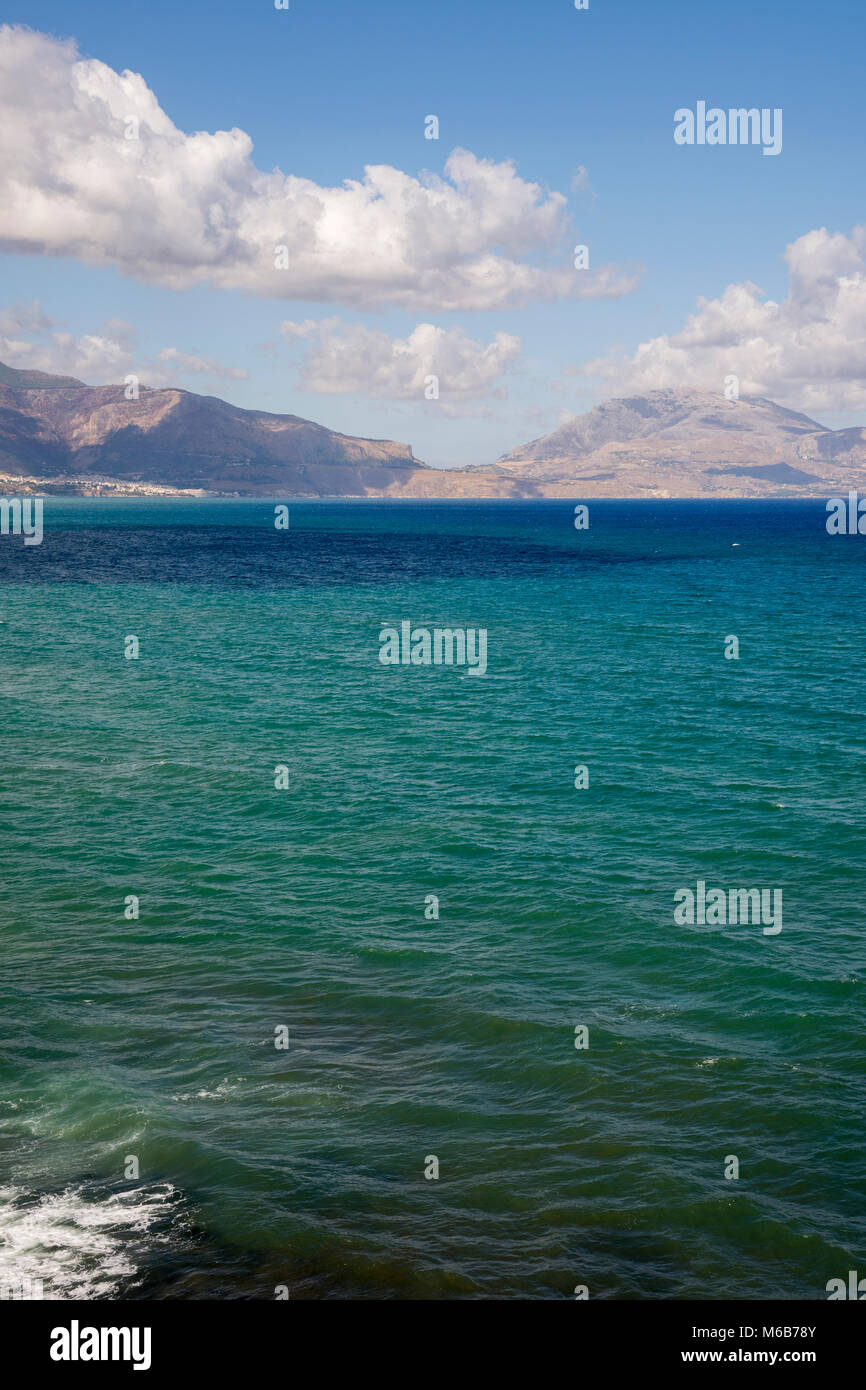 crystal clear sea and frothy waves on the beaches of Palermo in Sicily ...