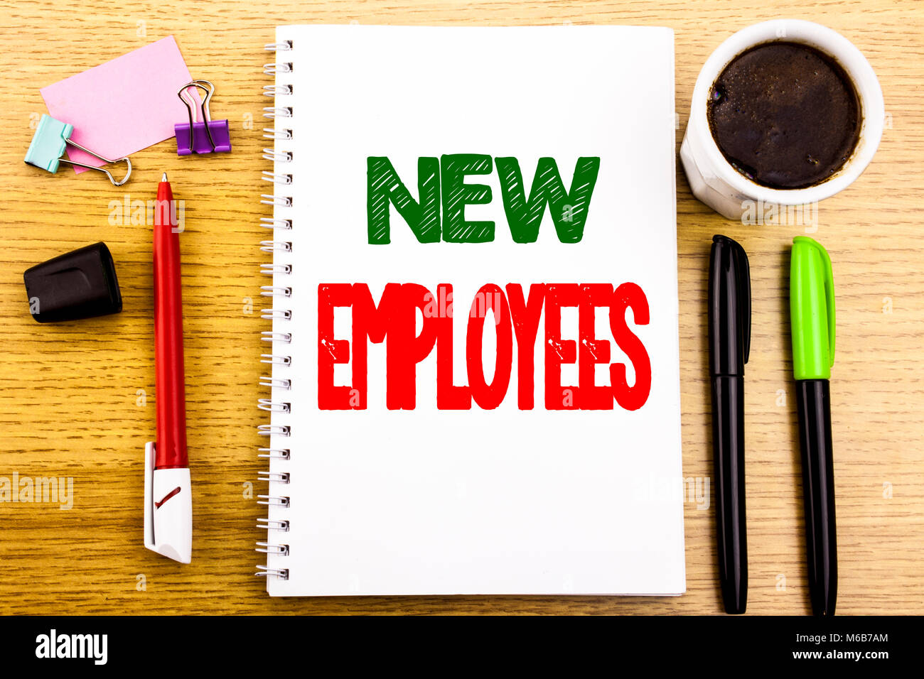 Hand writing text caption showing New Employees. Business concept for ...