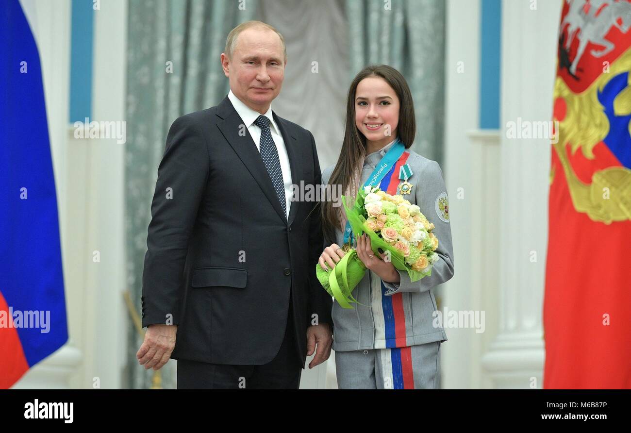 Russian President Vladimir Putin poses with Olympic figure skating gold ...