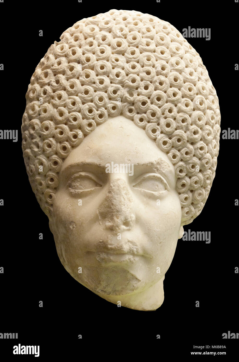 Female head carved in stone hi-res stock photography and images - Alamy