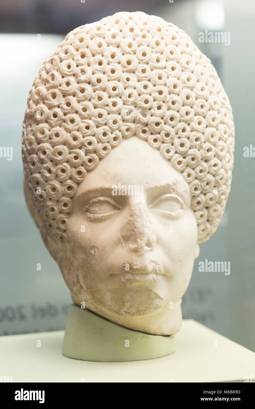 Female head carved in stone hi-res stock photography and images - Alamy