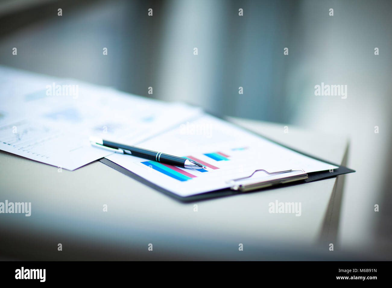financial charts and graphs on the table Stock Photo - Alamy